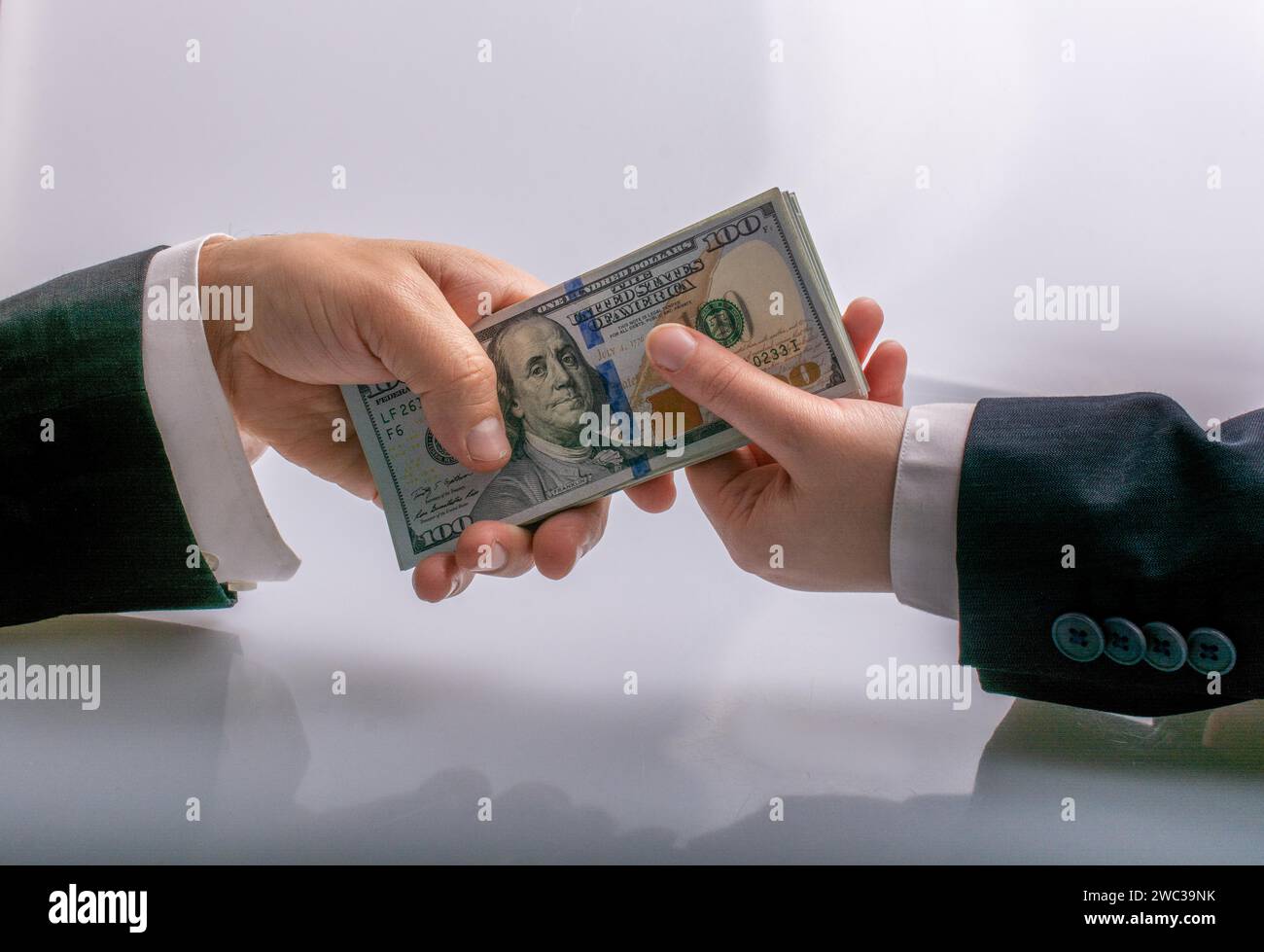 Man receiving money hi-res stock photography and images - Alamy