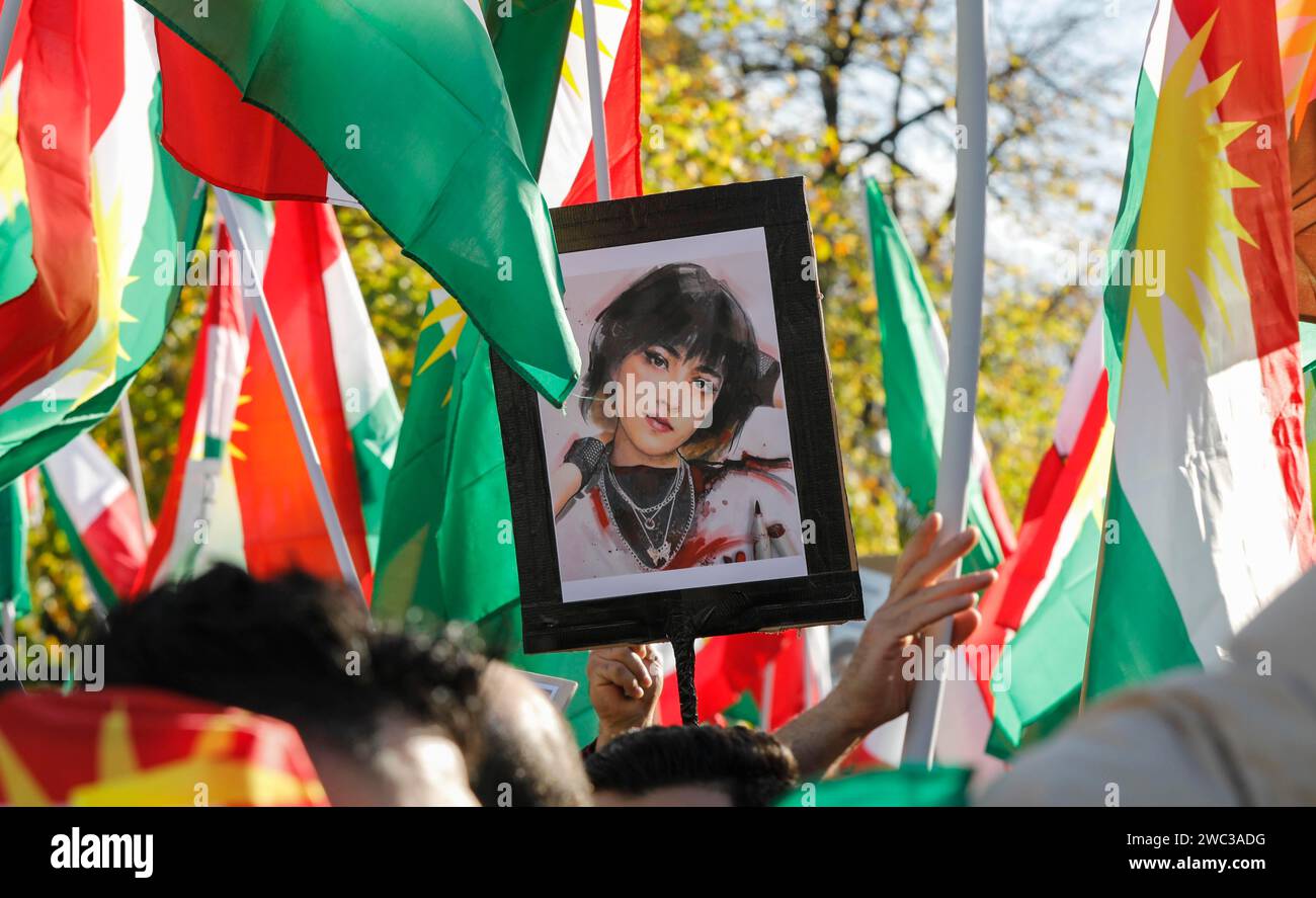 A picture of Mahsa Amini is shown at a demonstration in Berlin ...