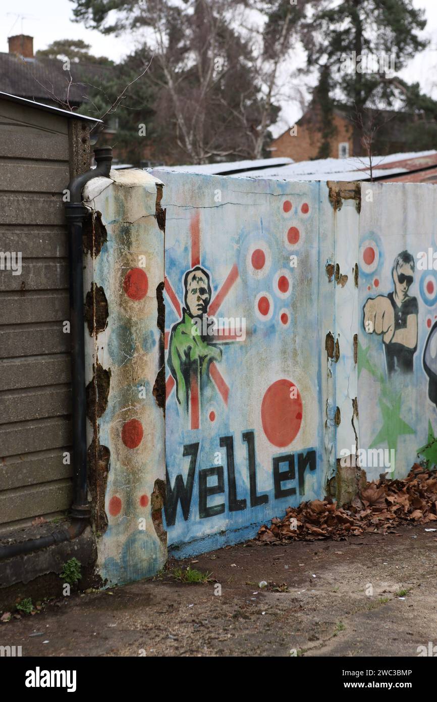 Sheerwater, Woking, Surrey. Wall mural with graffiti showing Paul ...