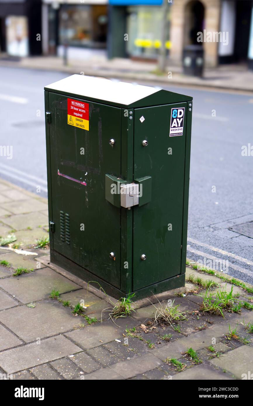 BT telecoms green cabinet street furniture for phone and fibre Stock Photo - Alamy