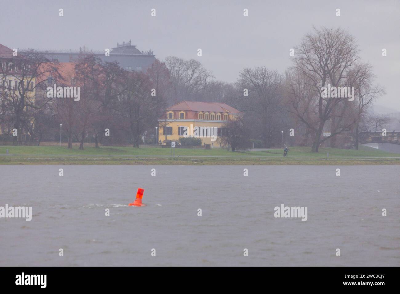 Rainy weather in Dresden city centre. Due to the heavy rainfall, river ...