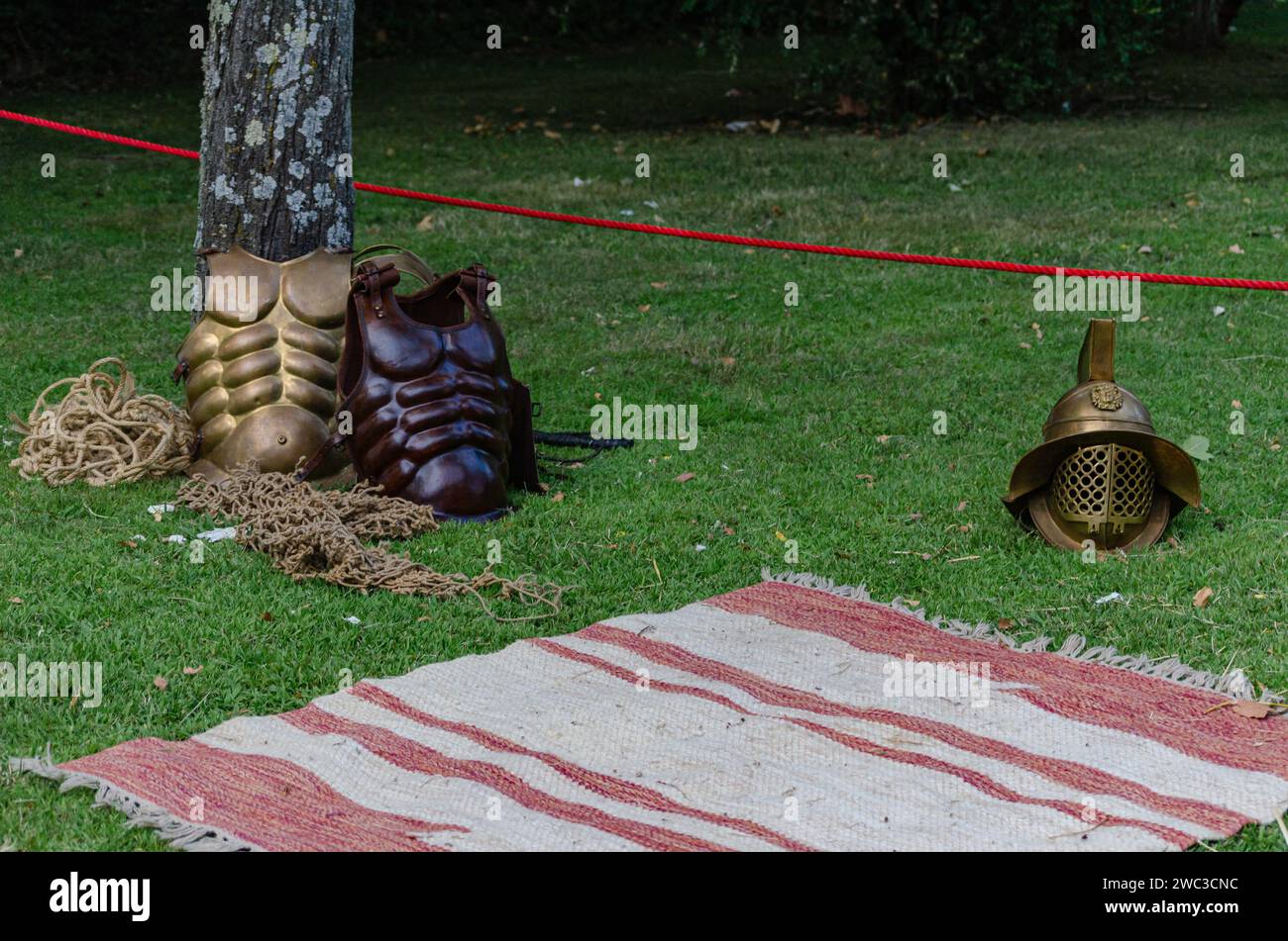 gladiator breastplates and helmet at a historical reenactment party ...