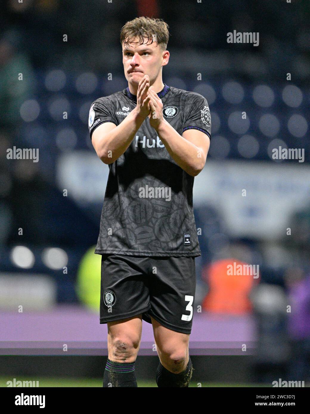 Preston, UK. 13th Jan, 2024. Cameron Pring of Bristol City claps fans ...