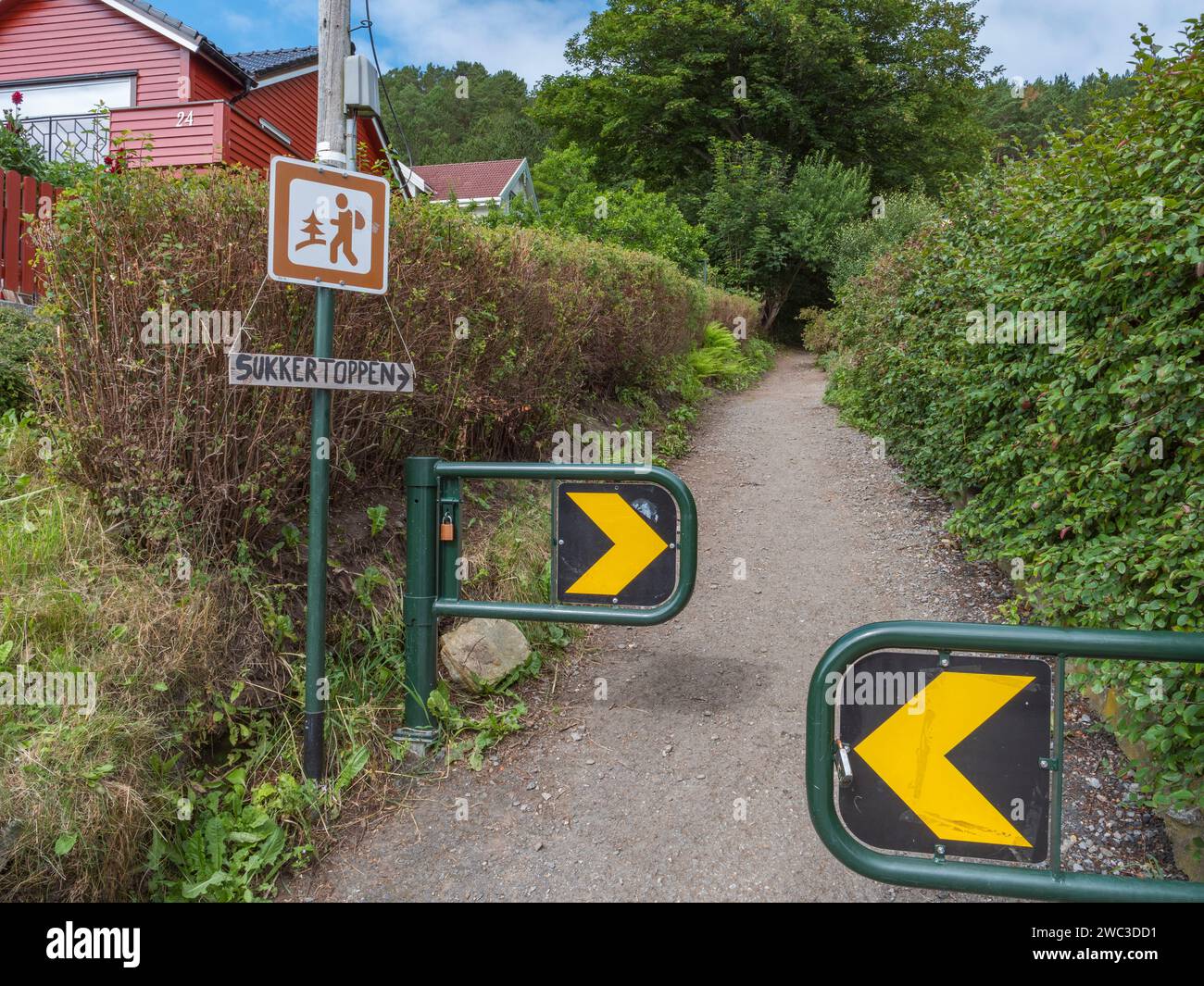 Footpath entrance leading to the summit of Sukkertoppen in Alesund ...
