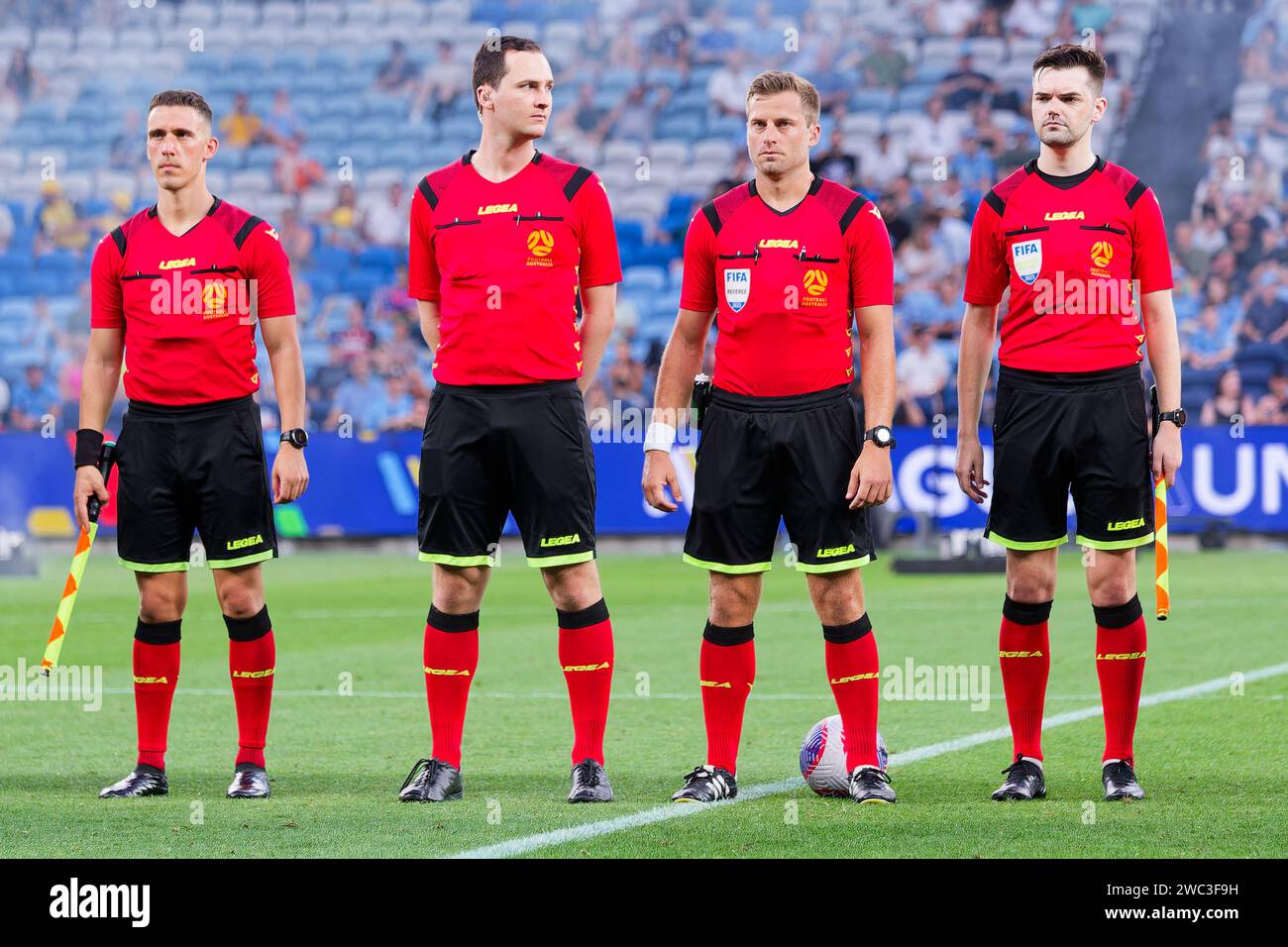 Sydney, Australia. 13th Jan, 2024. Match referees line up on the pitch ...