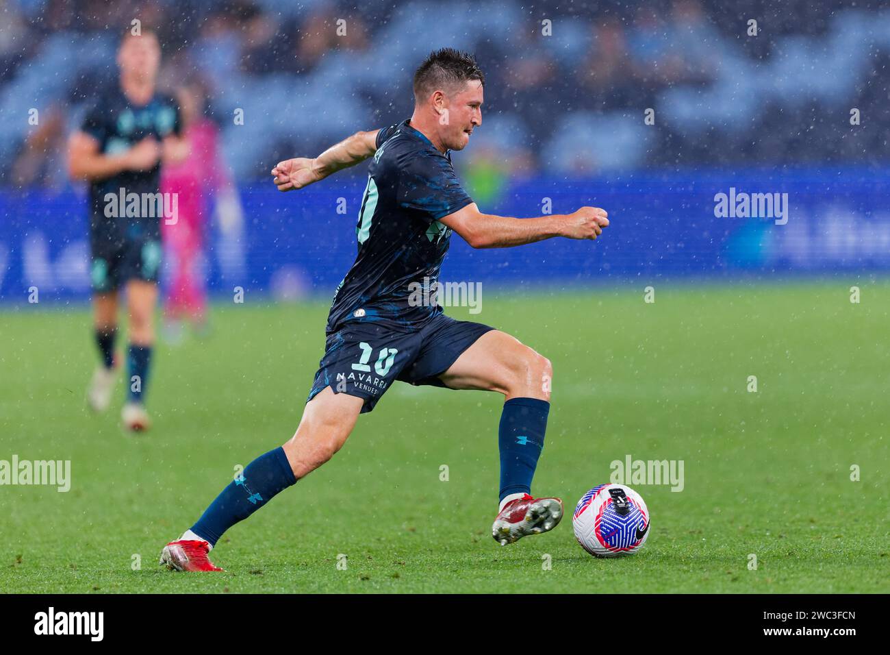 Sydney, Australia. 13th Jan, 2024. Joseph Lolley of Sydney FC controls ...