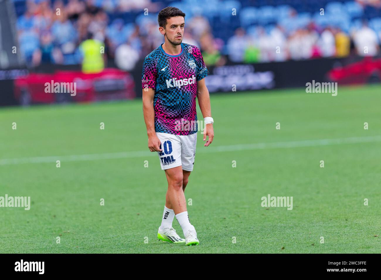 Sydney, Australia. 13th Jan, 2024. Zach Clough of Adelaide United warms ...