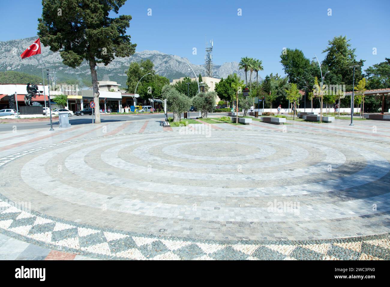 The morning view of decorated empty square in Kemer resort town ...