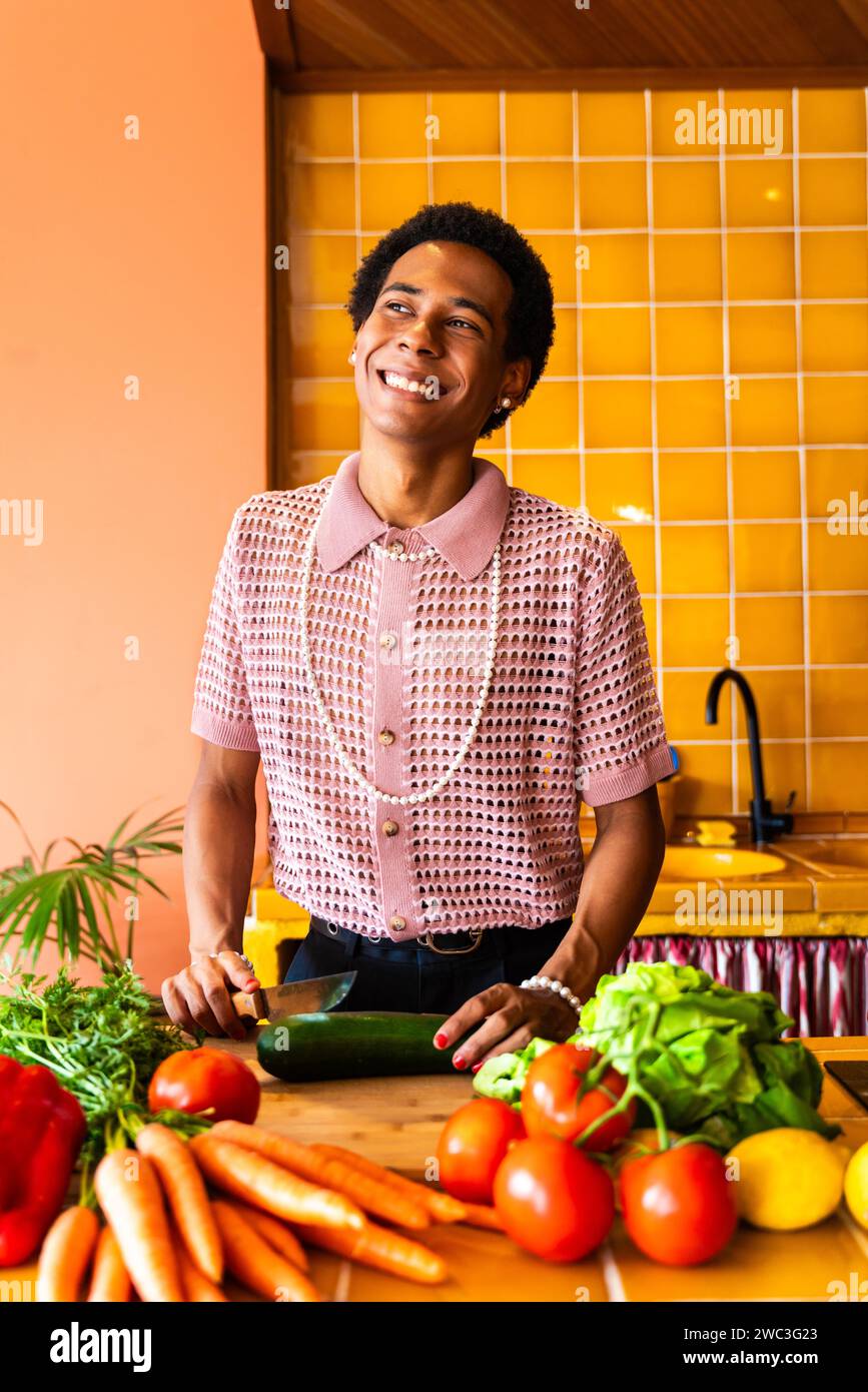 Fluid gender young man wearing cross dressing clothing at home, LGBTQ ...