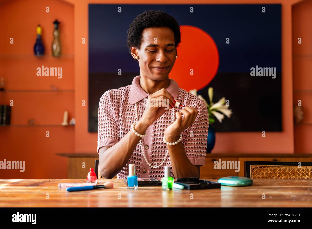 Fluid gender young man wearing cross dressing clothing at home, LGBTQ ...