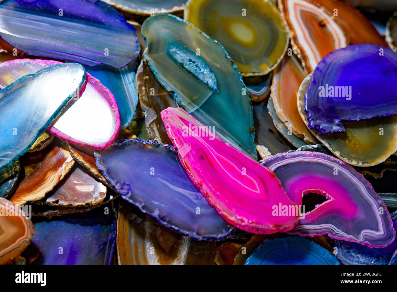 Colorful slices of agates. Mineral exchange Stock Photo - Alamy
