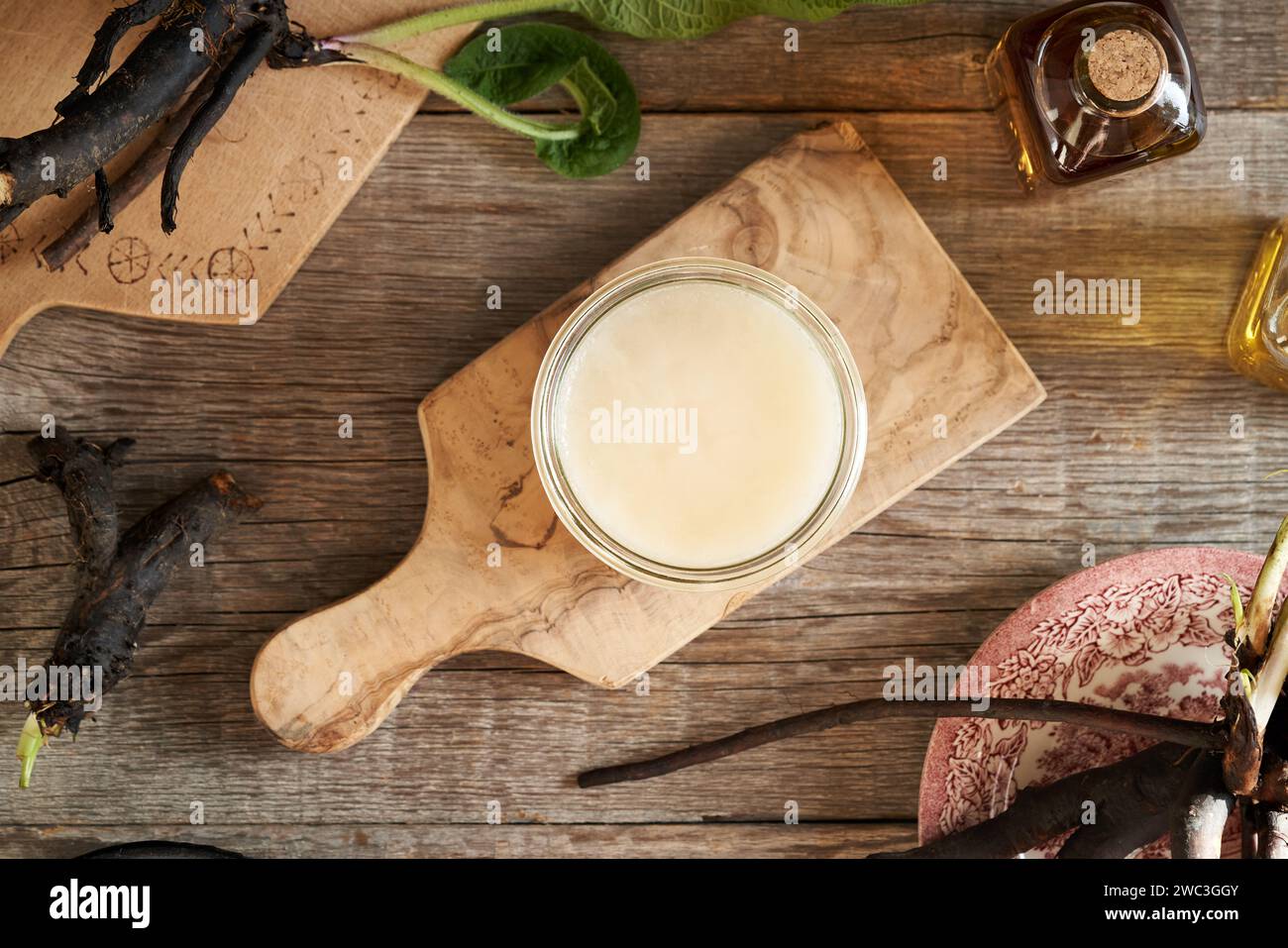 Cooled homemade comfrey root ointment made of rendered pork lard, top ...