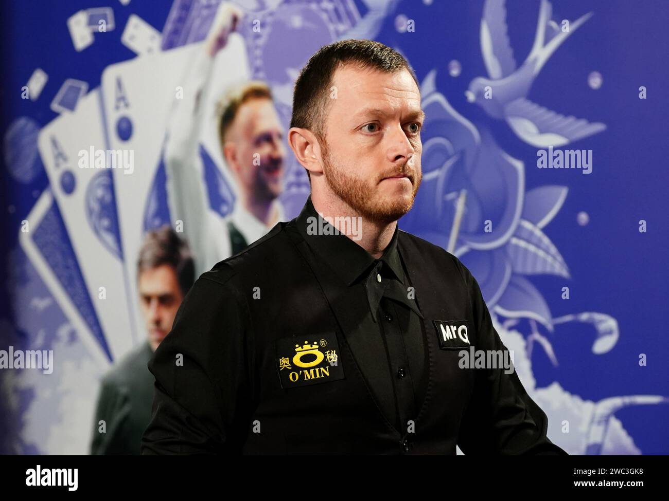 Mark Allen returns to the table during his match semi final match ...