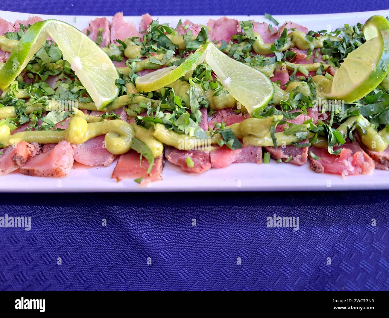 Tuna tiradito is a dish of Peruvian origin that consists of raw fish ...