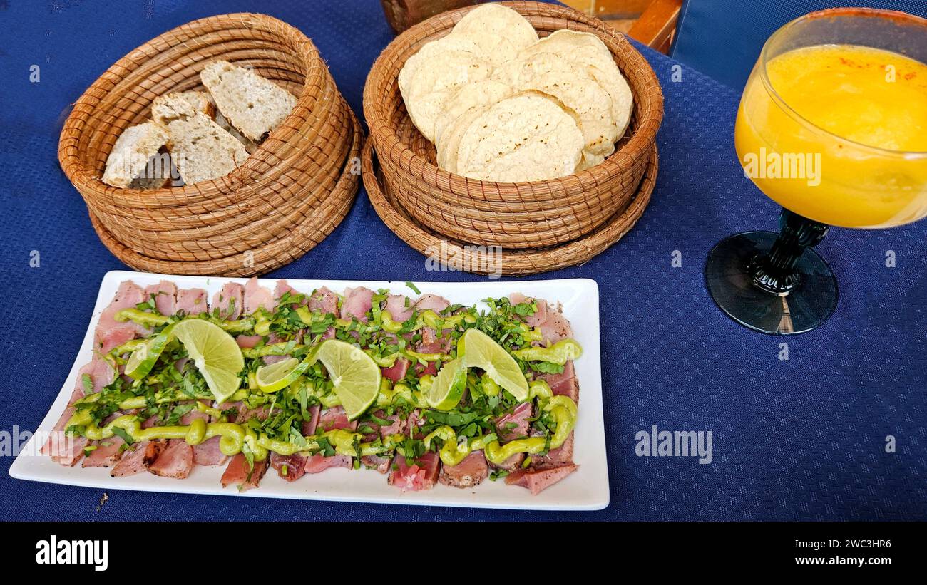 Tuna tiradito is a dish of Peruvian origin that consists of raw fish ...