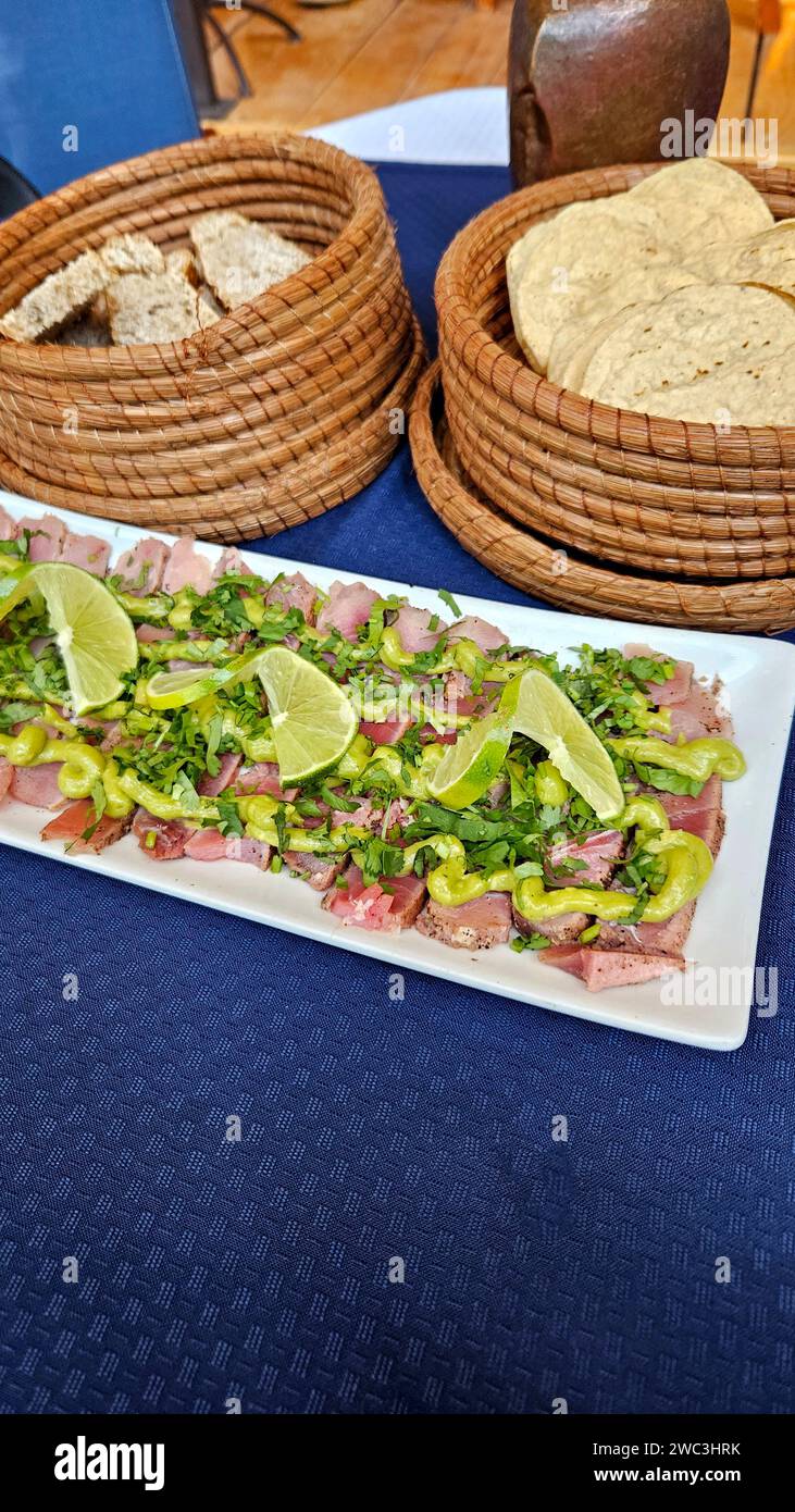 Tuna tiradito is a dish of Peruvian origin that consists of raw fish ...
