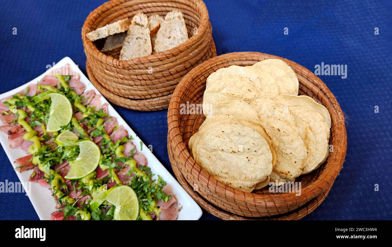 Tuna tiradito is a dish of Peruvian origin that consists of raw fish ...