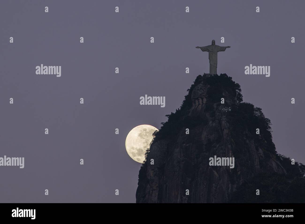 full moon and Christ the Redeemer in Rio de Janeiro, Brazil - August 2 ...