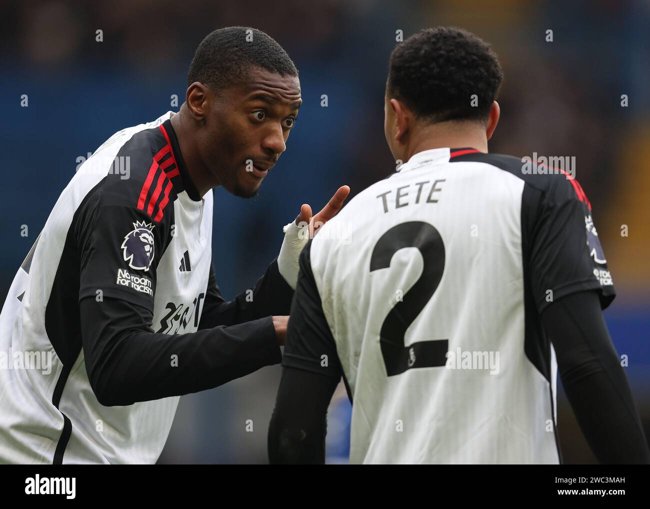 London, UK. 13th Jan, 2024. Tosin Adarabioyo (L) of Fulham talks with ...