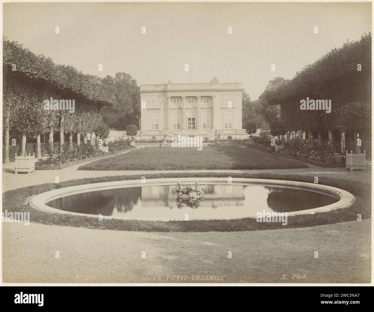 View of Petit Trianon in the gardens of the castle of Versailles, x ...