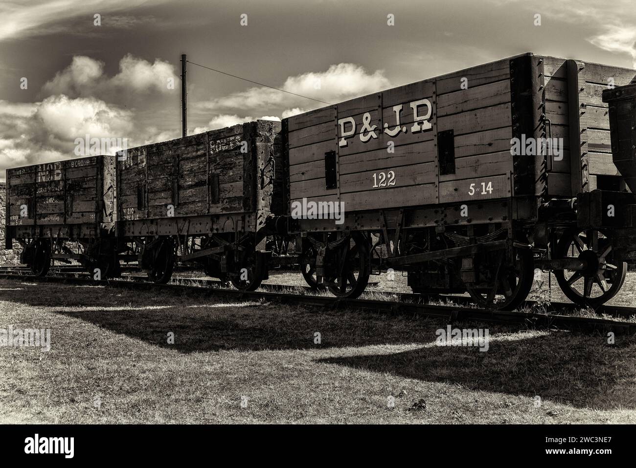 A selection of old wooden-bodied railway coal wagons, pictured at the ...