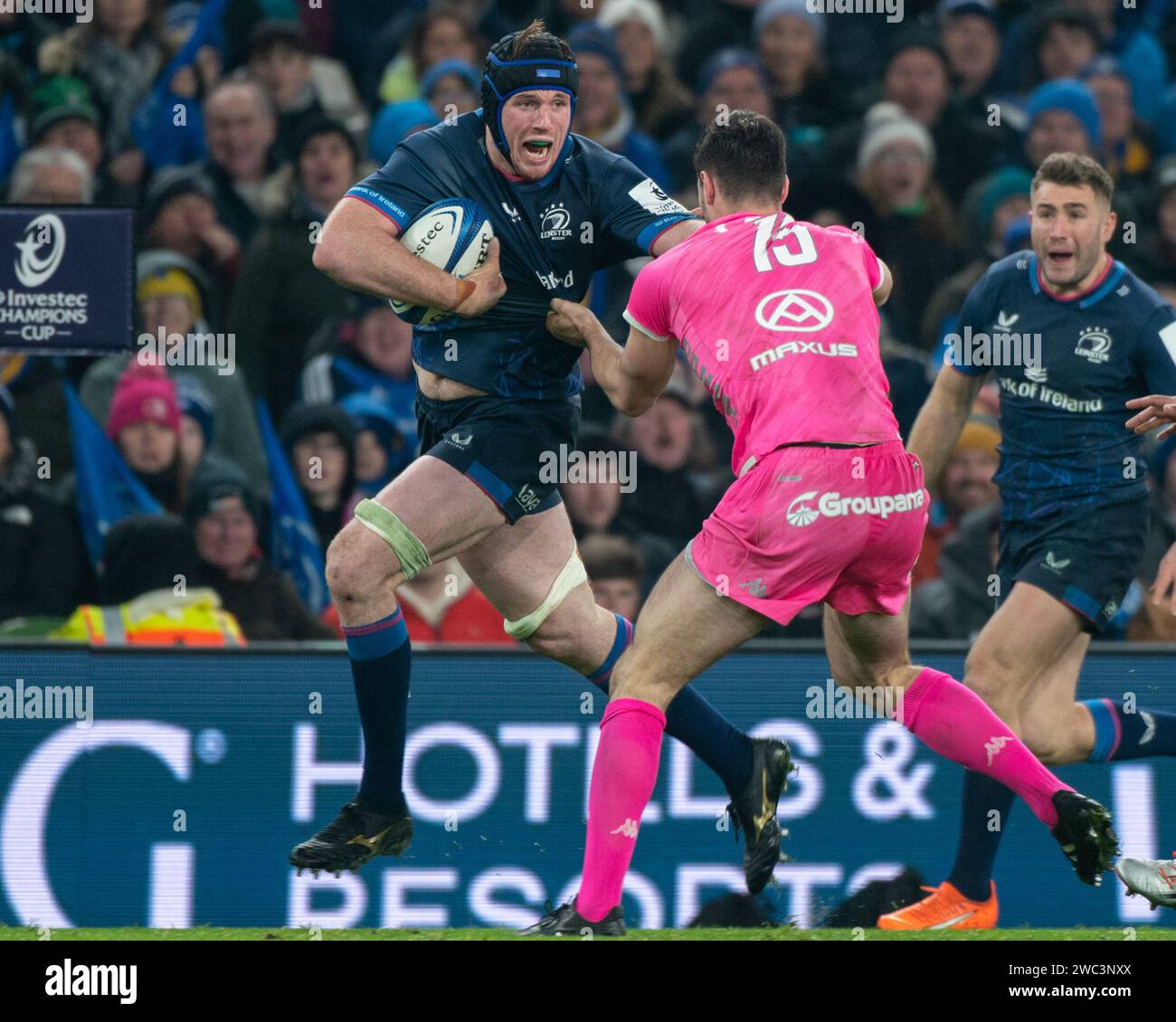 Dublin, Ireland. 13th Jan, 2024. Ryan Baird of Leinster tackled by Leo ...