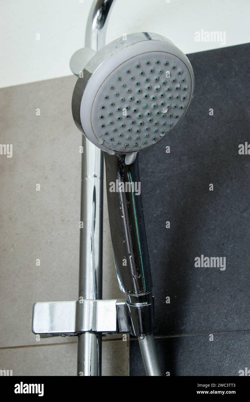 Cleaning shower head gloves hi-res stock photography and images - Alamy