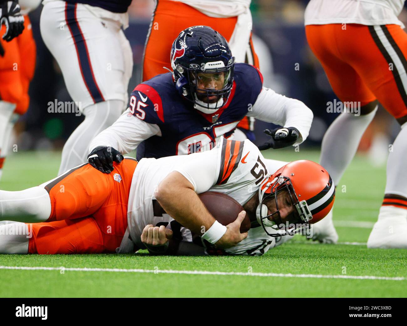 January 13, 2024: Texans defensive end Derek Barnett (95) sacks Browns ...
