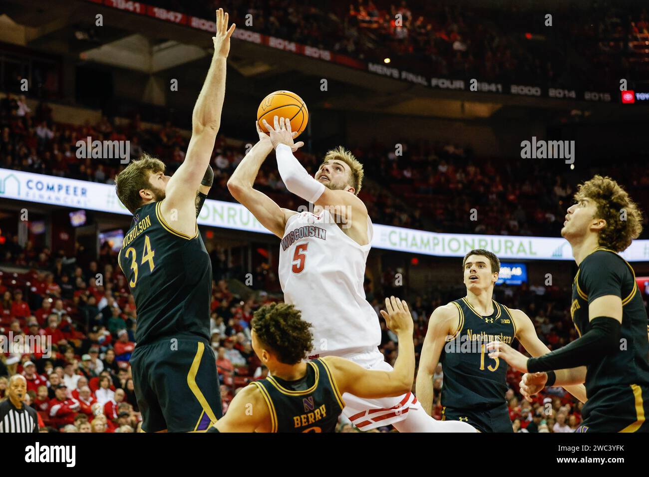 Madison, WI, USA. 13th Jan, 2024. Wisconsin Badgers forward Tyler Wahl ...