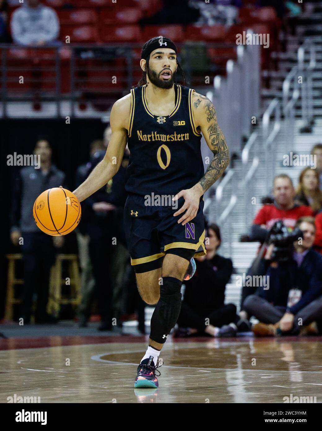 Madison, WI, USA. 13th Jan, 2024. Northwestern Wildcats guard Boo Buie ...