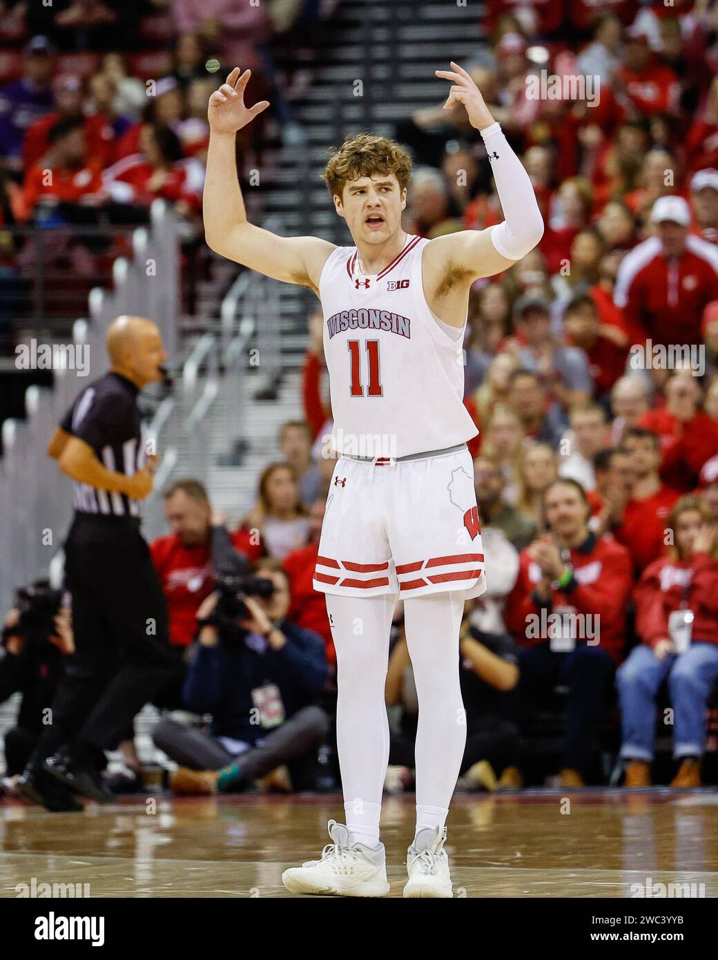 Madison, WI, USA. 13th Jan, 2024. Wisconsin Badgers guard Max Klesmit ...