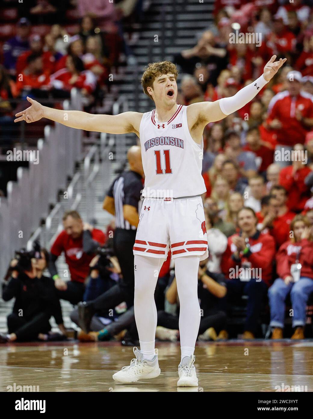Madison, WI, USA. 13th Jan, 2024. Wisconsin Badgers guard Max Klesmit ...