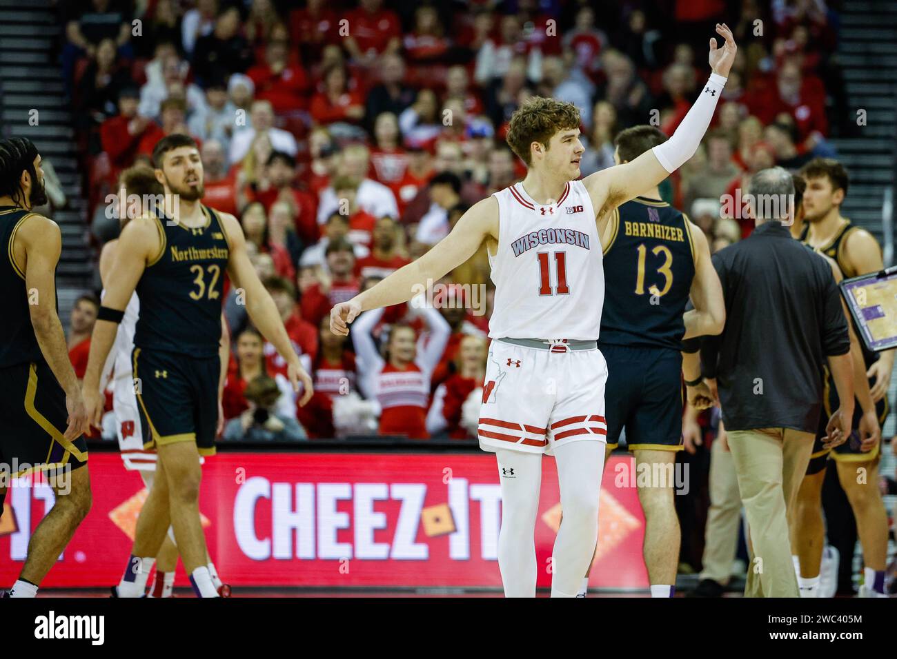 Madison, WI, USA. 13th Jan, 2024. Wisconsin Badgers guard Max Klesmit ...