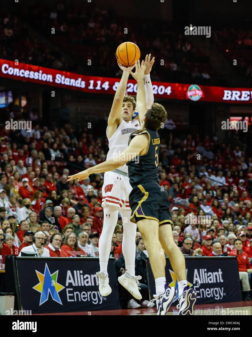 Madison, WI, USA. 13th Jan, 2024. Wisconsin Badgers guard Max Klesmit ...