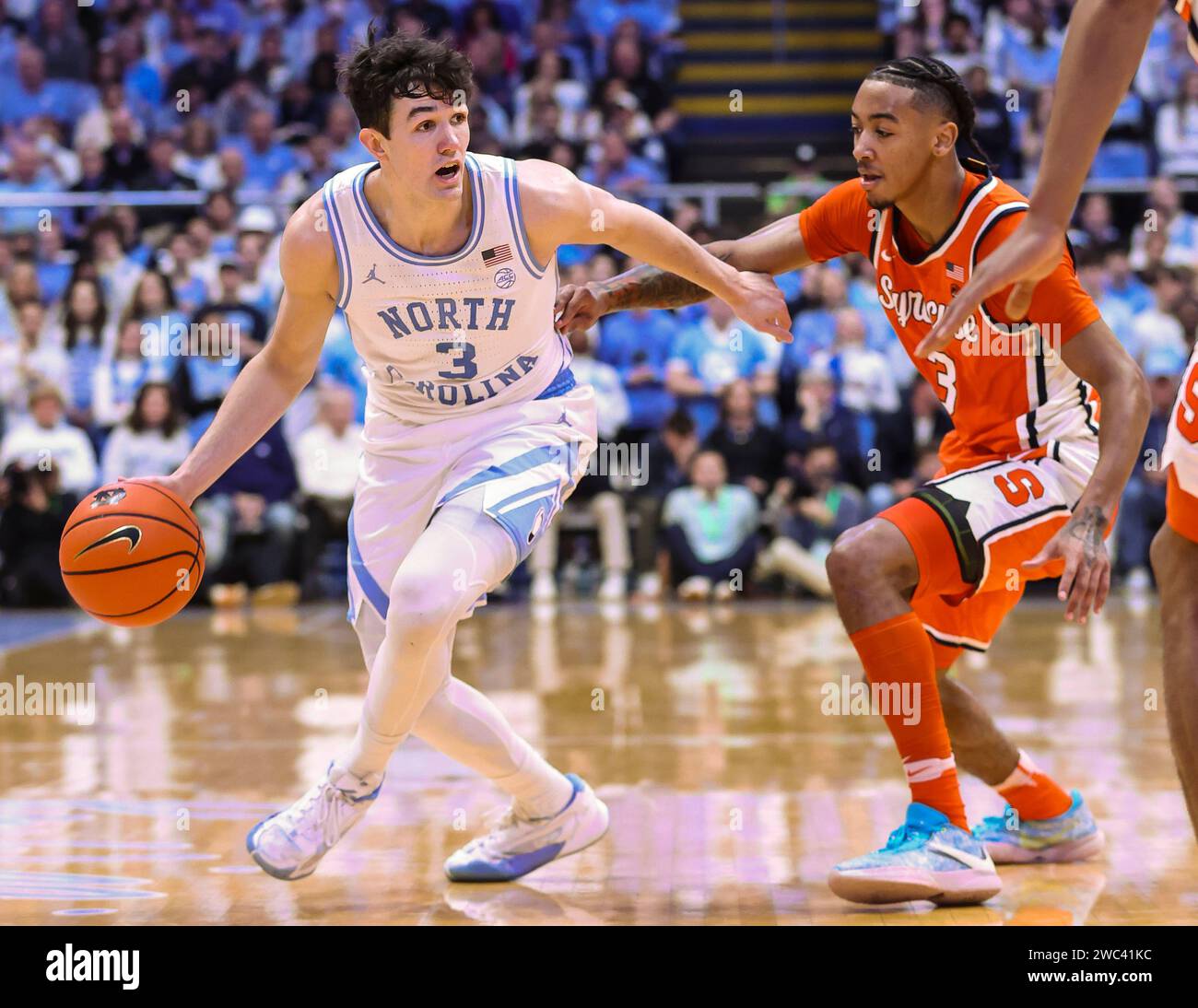 January 13, 2024: North Carolina senior Cormac Ryan (3) drives to the ...