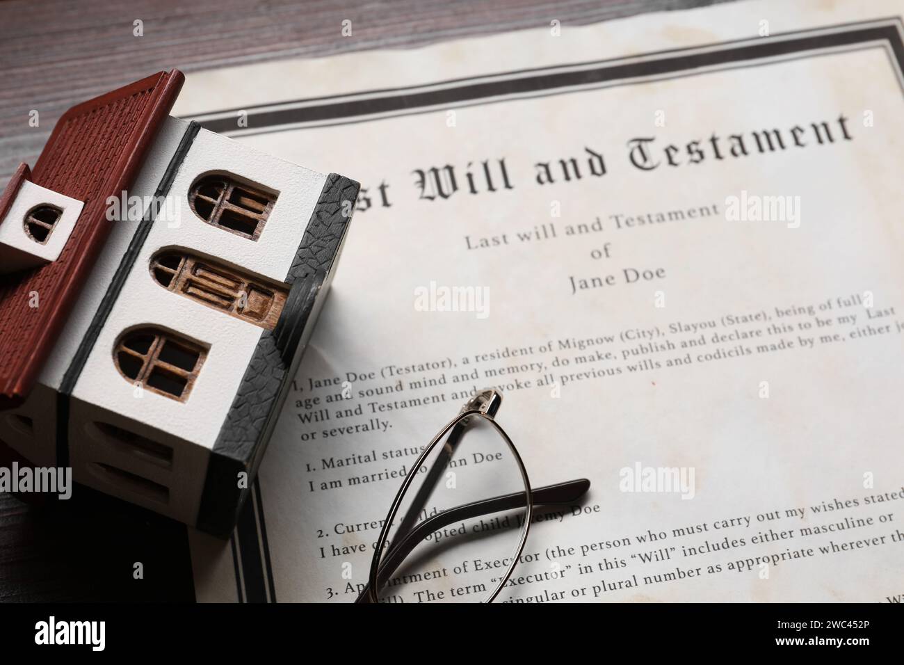 Last Will and Testament, house model and glasses on wooden table ...