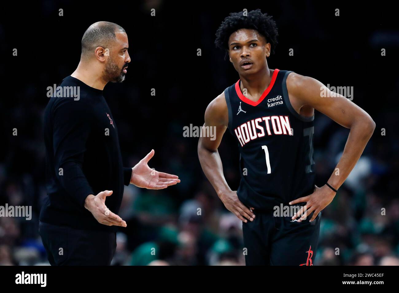 Houston Rockets head coach Ime Udoka talks with Houston Rockets' Amen ...
