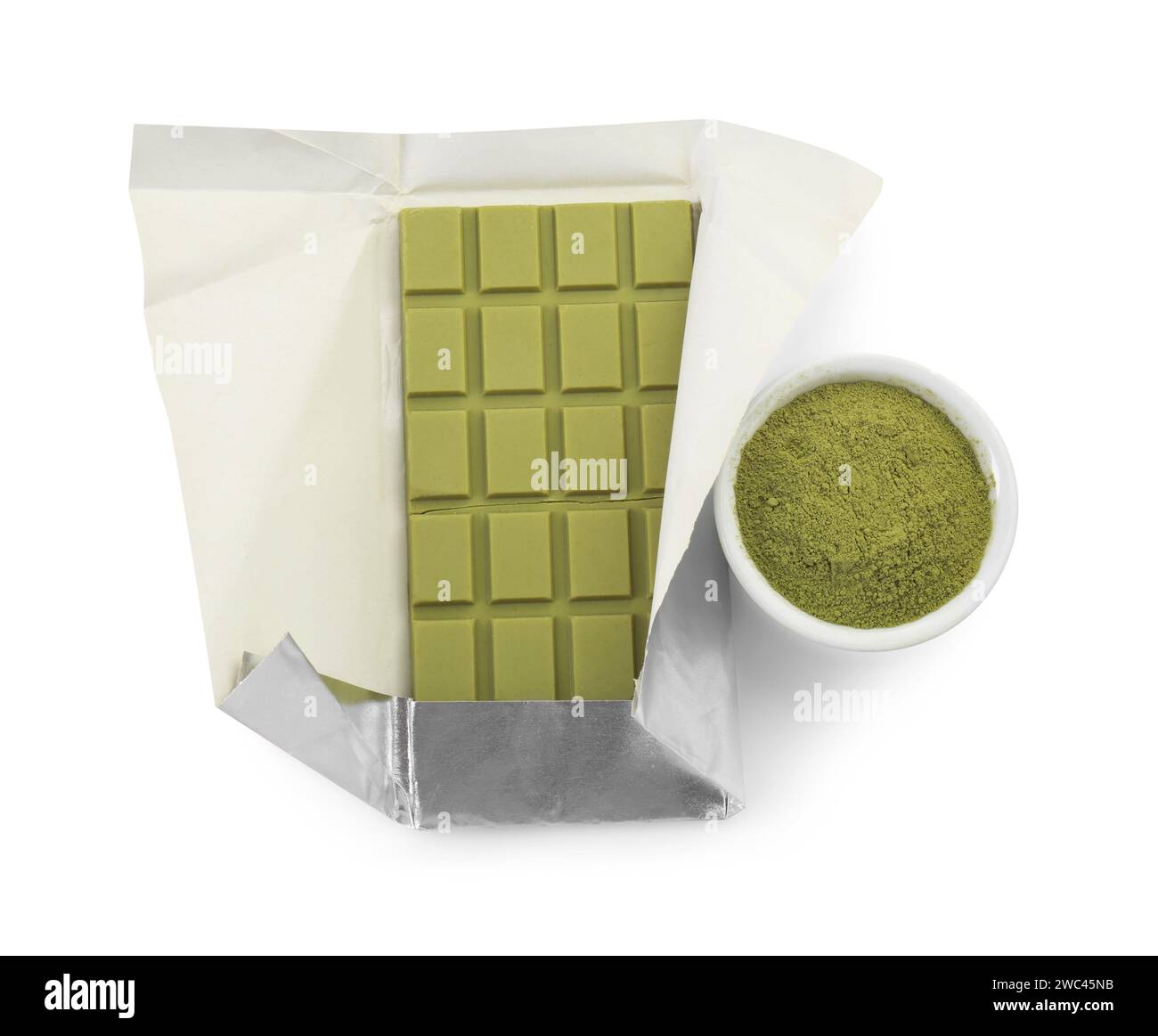 Tasty matcha chocolate bar wrapped in foil and powder isolated on white ...