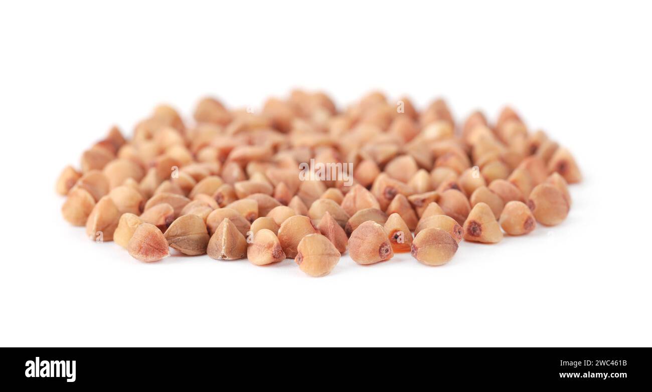 Many dry buckwheat grains isolated on white Stock Photo - Alamy