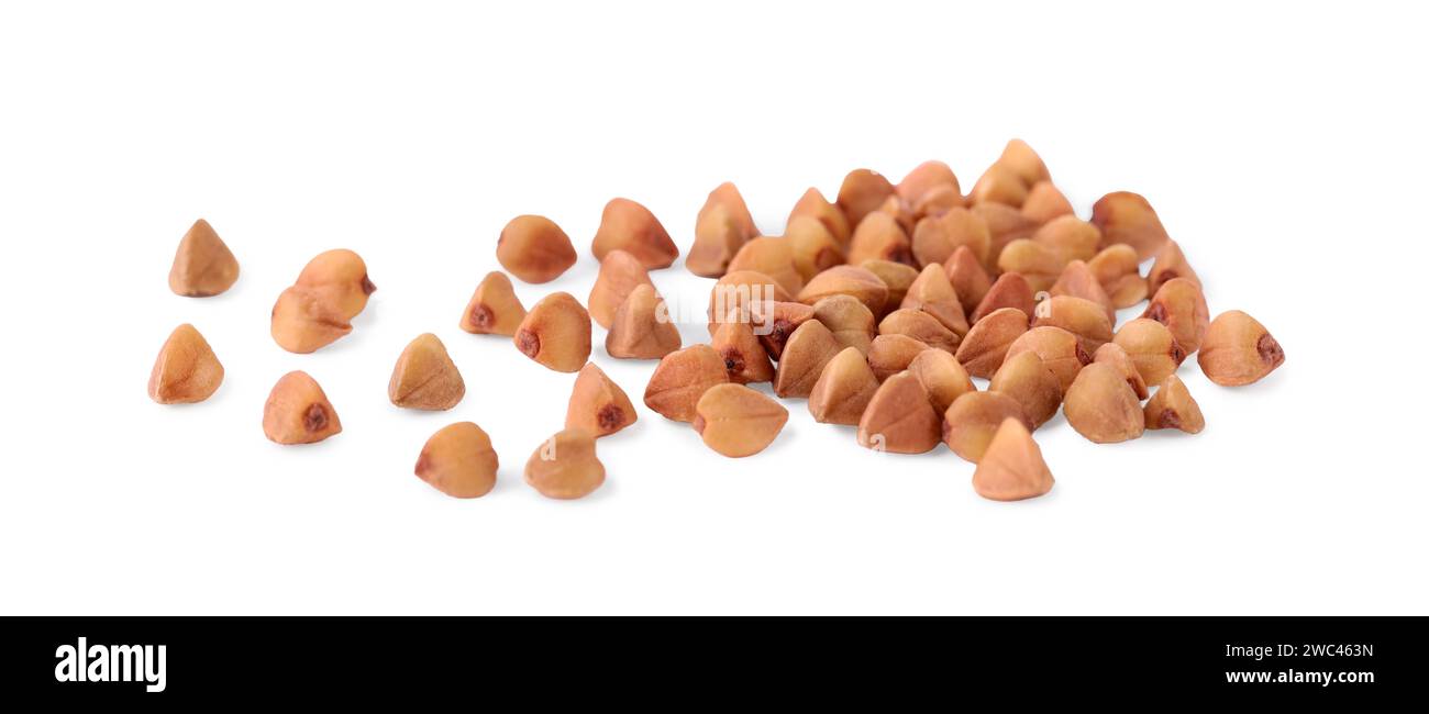 Many dry buckwheat grains isolated on white Stock Photo - Alamy