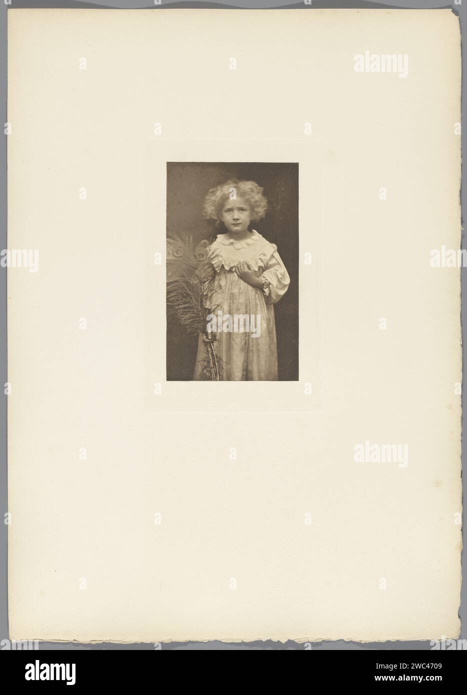 Portrait of an unknown child with a peacock feather, Walter L. Colls, c ...