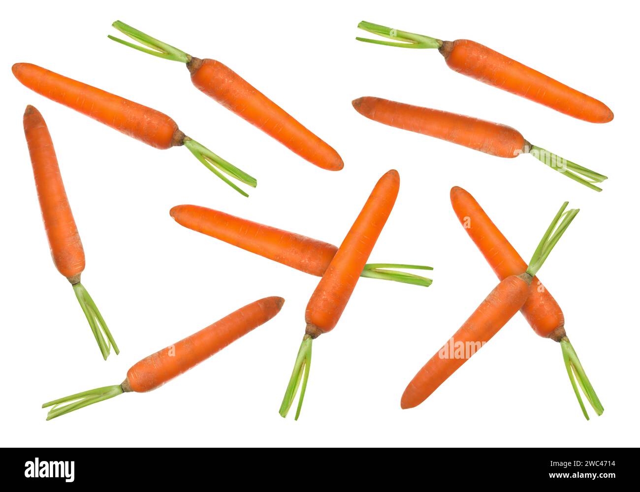 Fresh ripe carrots falling on white background Stock Photo - Alamy