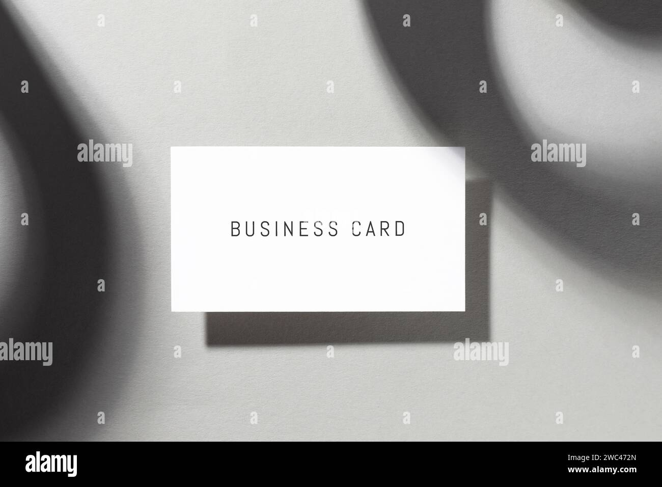 Business card on white background with shadow, top view Stock Photo - Alamy
