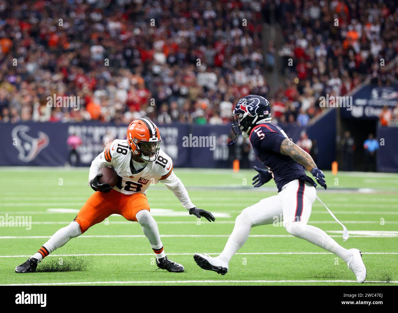 January 13, 2024: Browns wide receiver David Bell (18) squares off ...