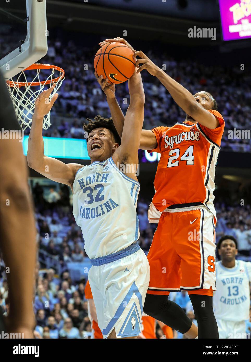 January 13, 2024: North Carolina junior James Okonkwo (32) and Syracuse ...