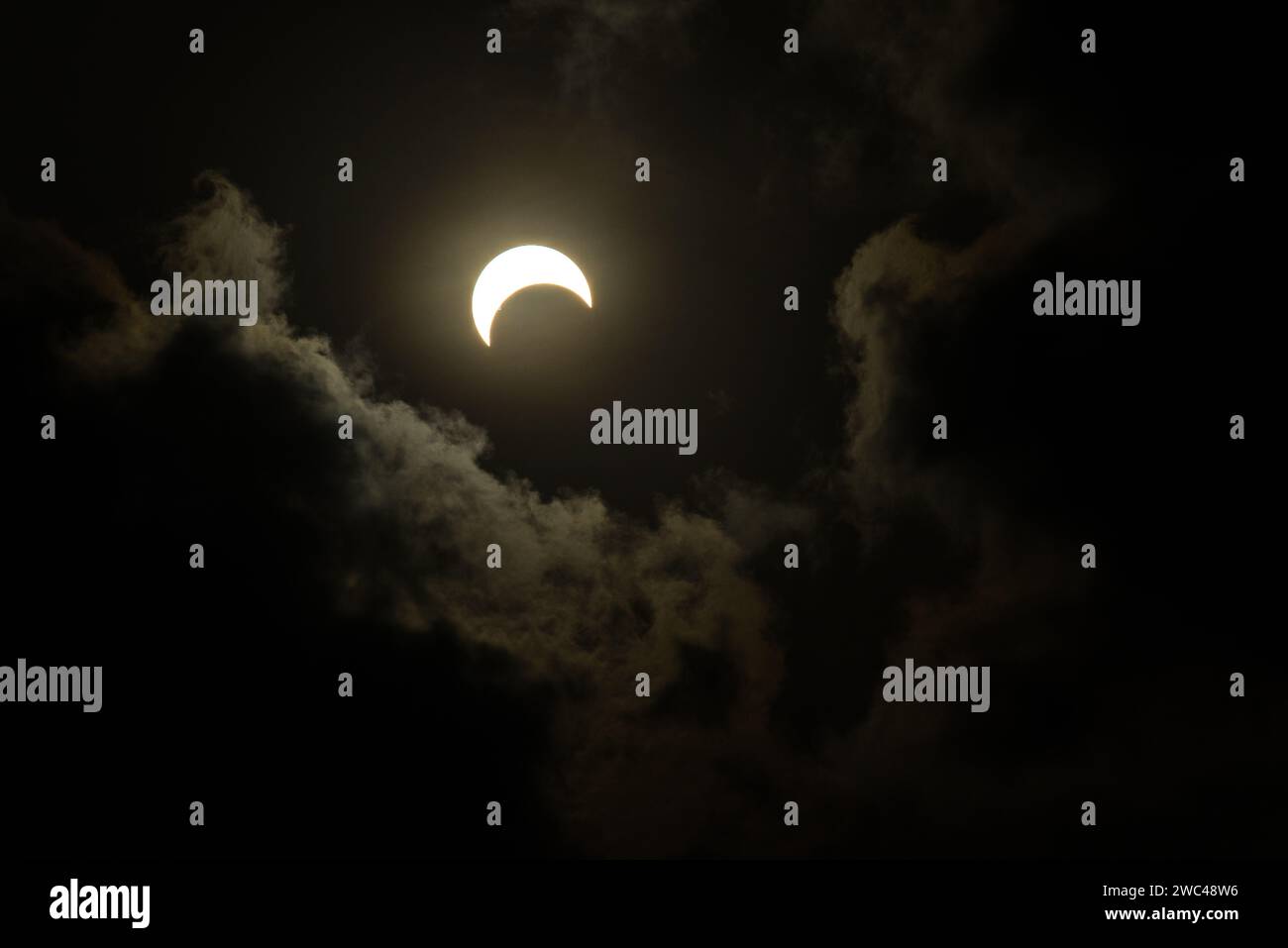 Partial Solar Eclipse of October 14, 2023 during sunset as seen from ...