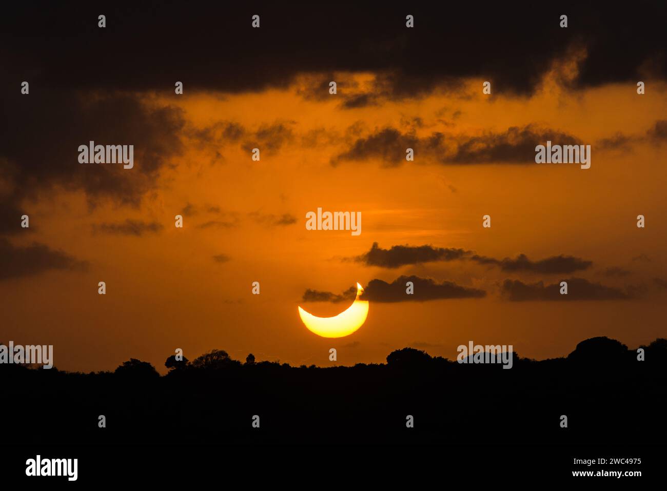 Partial Solar Eclipse of October 14, 2023 during sunset as seen from ...