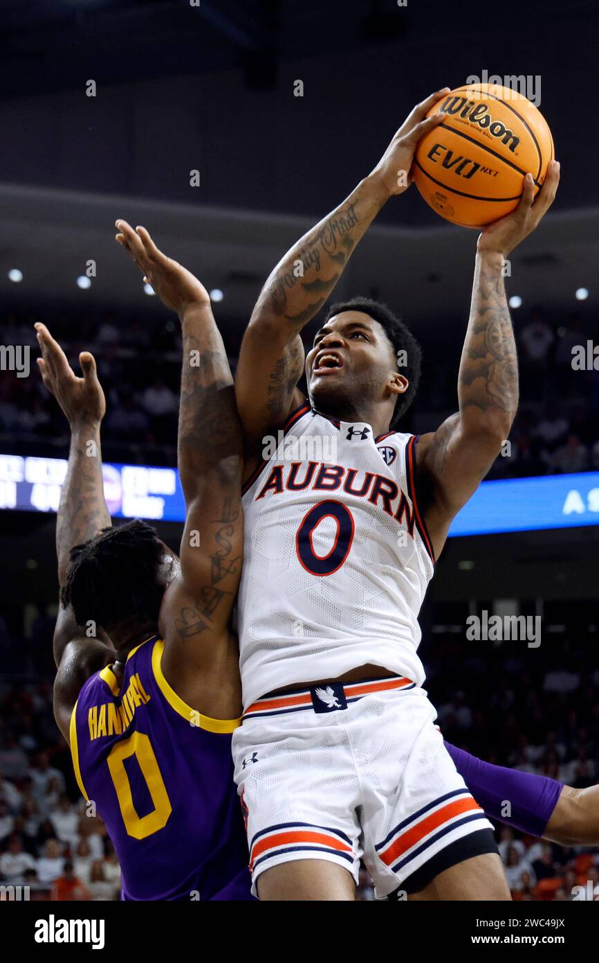 Auburn guard K.D. Johnson (0) shoots over LSU guard Trae Hannibal (0 ... Auburn guard K.D. Johnson (0) shoots over LSU guard Trae Hannibal (0 ...