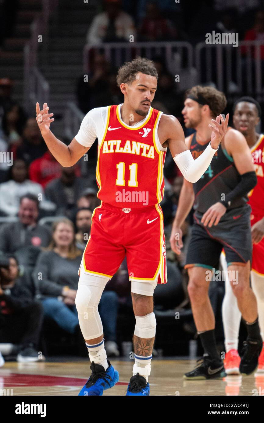 Atlanta Hawks guard Trae Young (11) reacts after making a 3-point ...