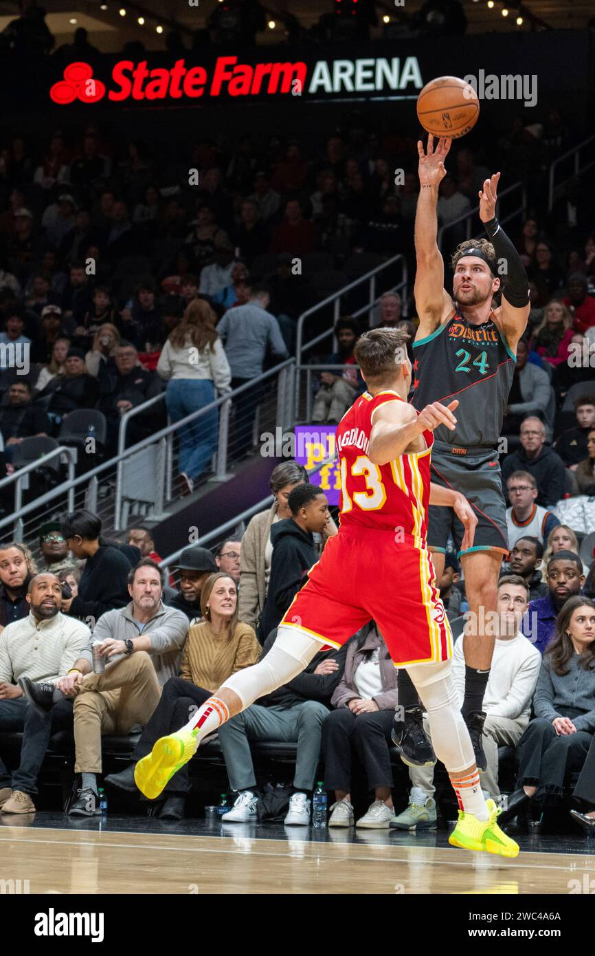 Washington Wizards forward Corey Kispert (24) shoots a three pointer ...